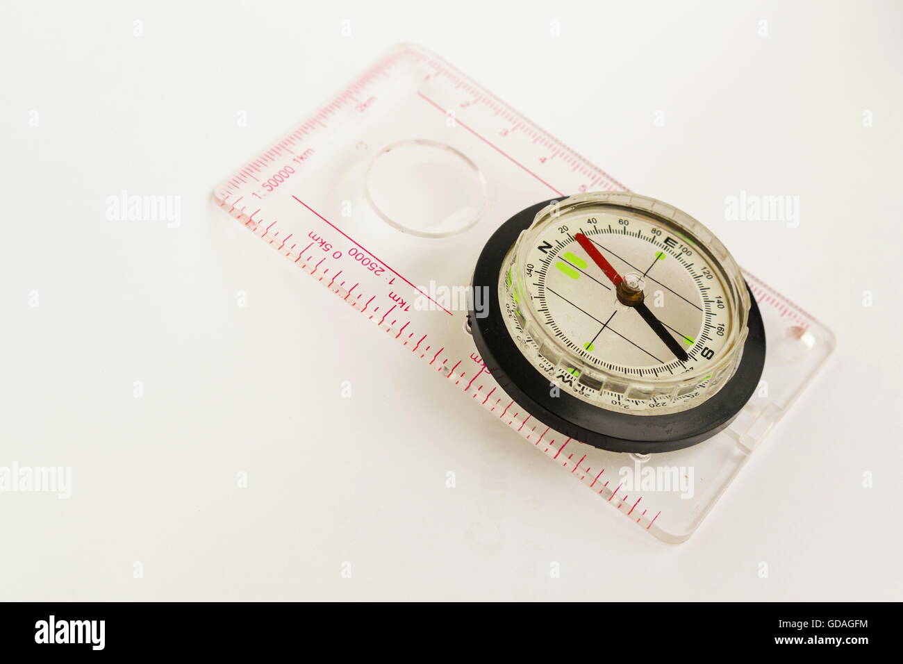 Detail shot of glass compass isolated on white background Stock Photo ...