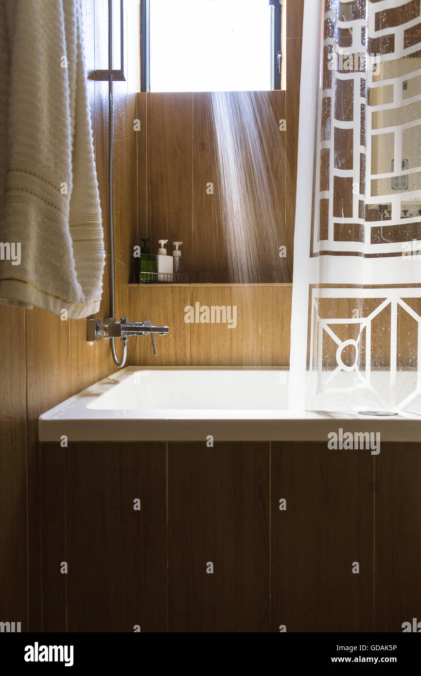 Modern Bath Interior with running shower Stock Photo - Alamy