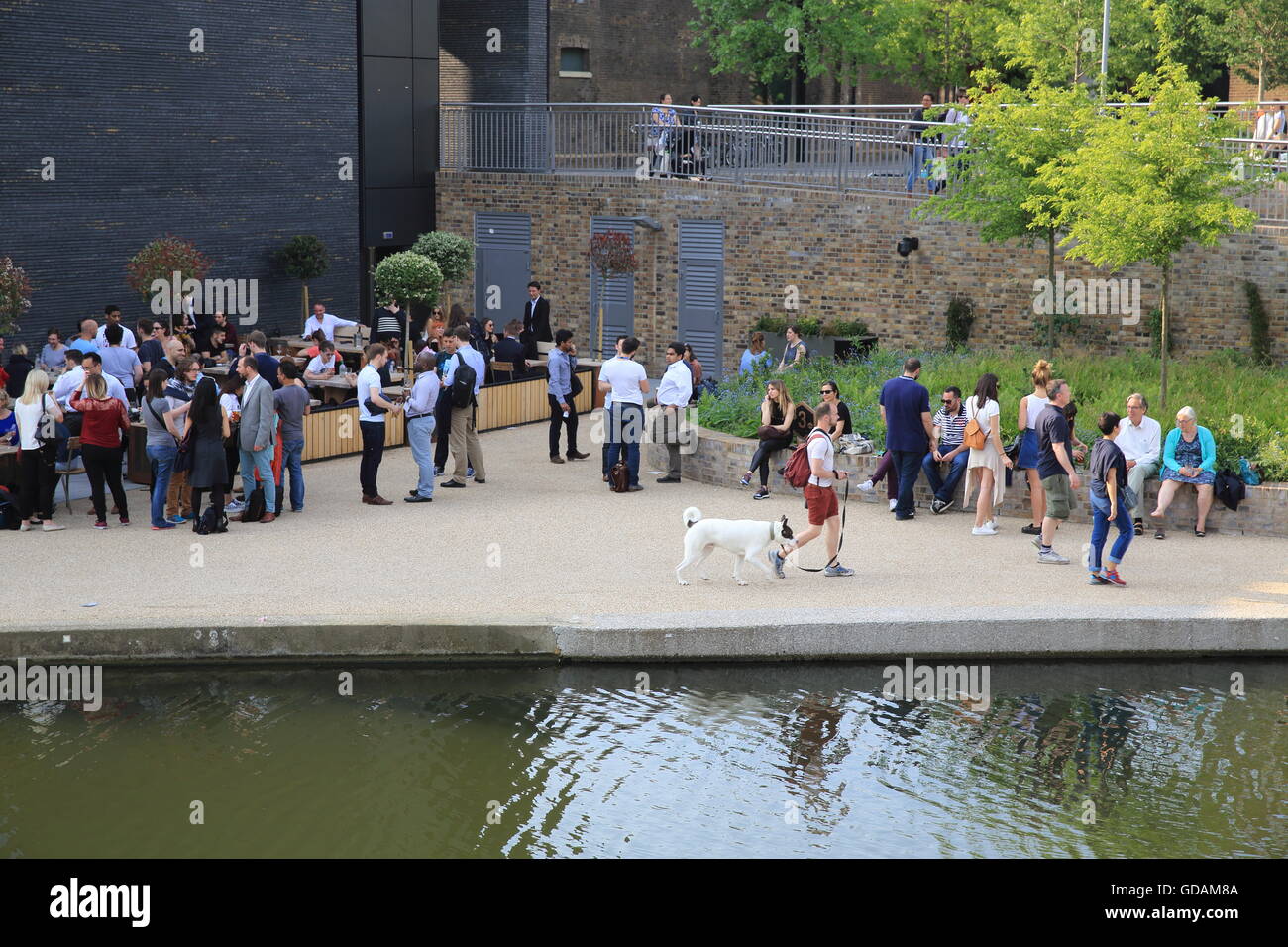 People relaxing at the canal side bar at the Lighterman gastro pub on ...