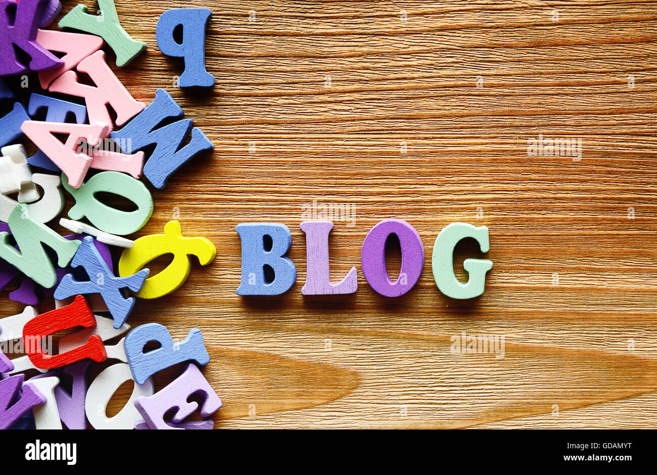 BLOG - word made from multicolored child toy letters on wooden ...