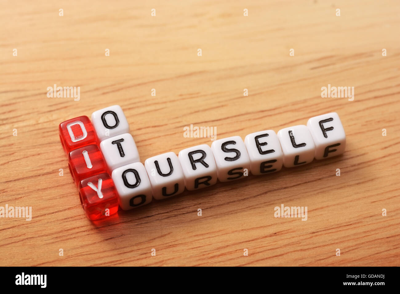 Wooden cube dice letters hi-res stock photography and images - Alamy