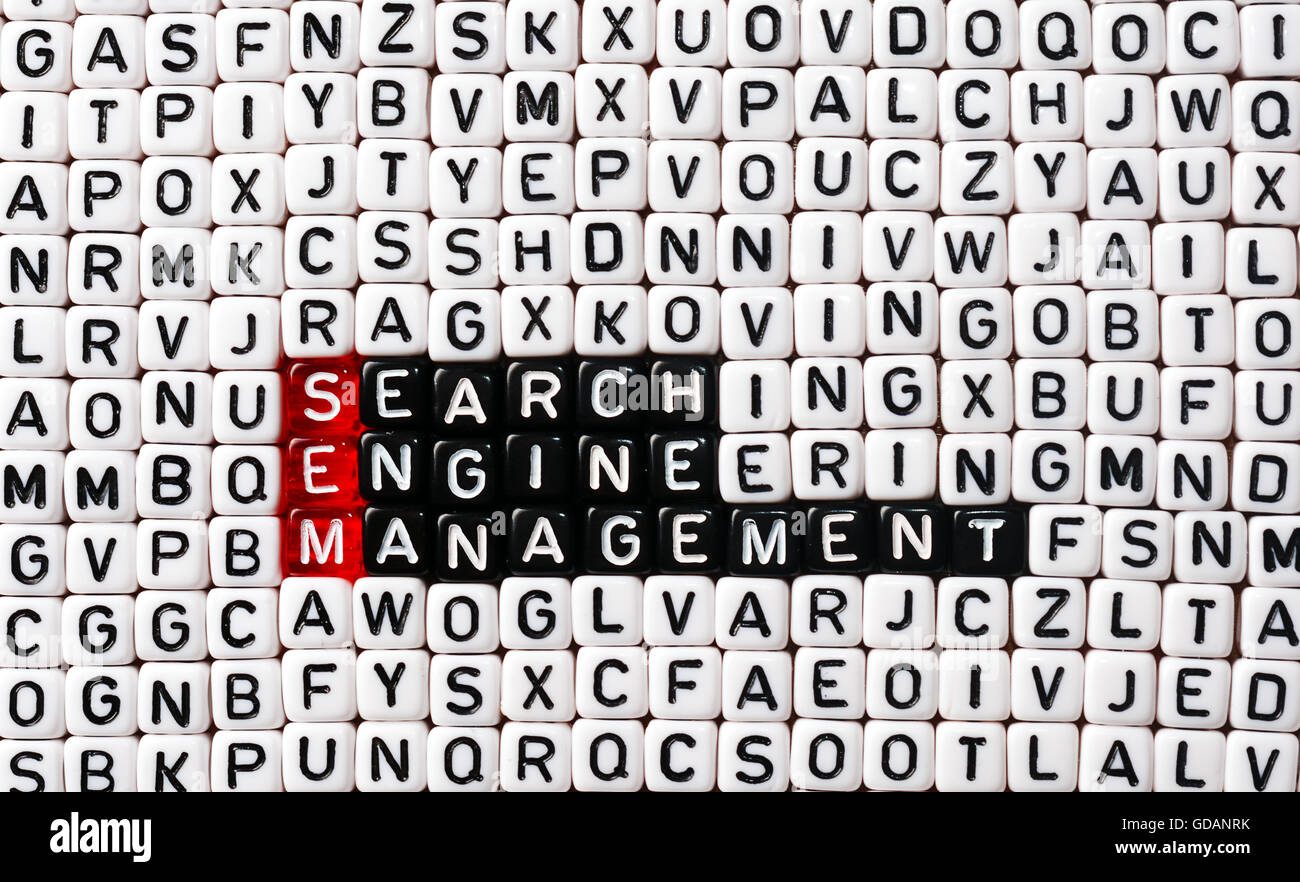 SEM Search Engine Management written on black and white dices Stock ...
