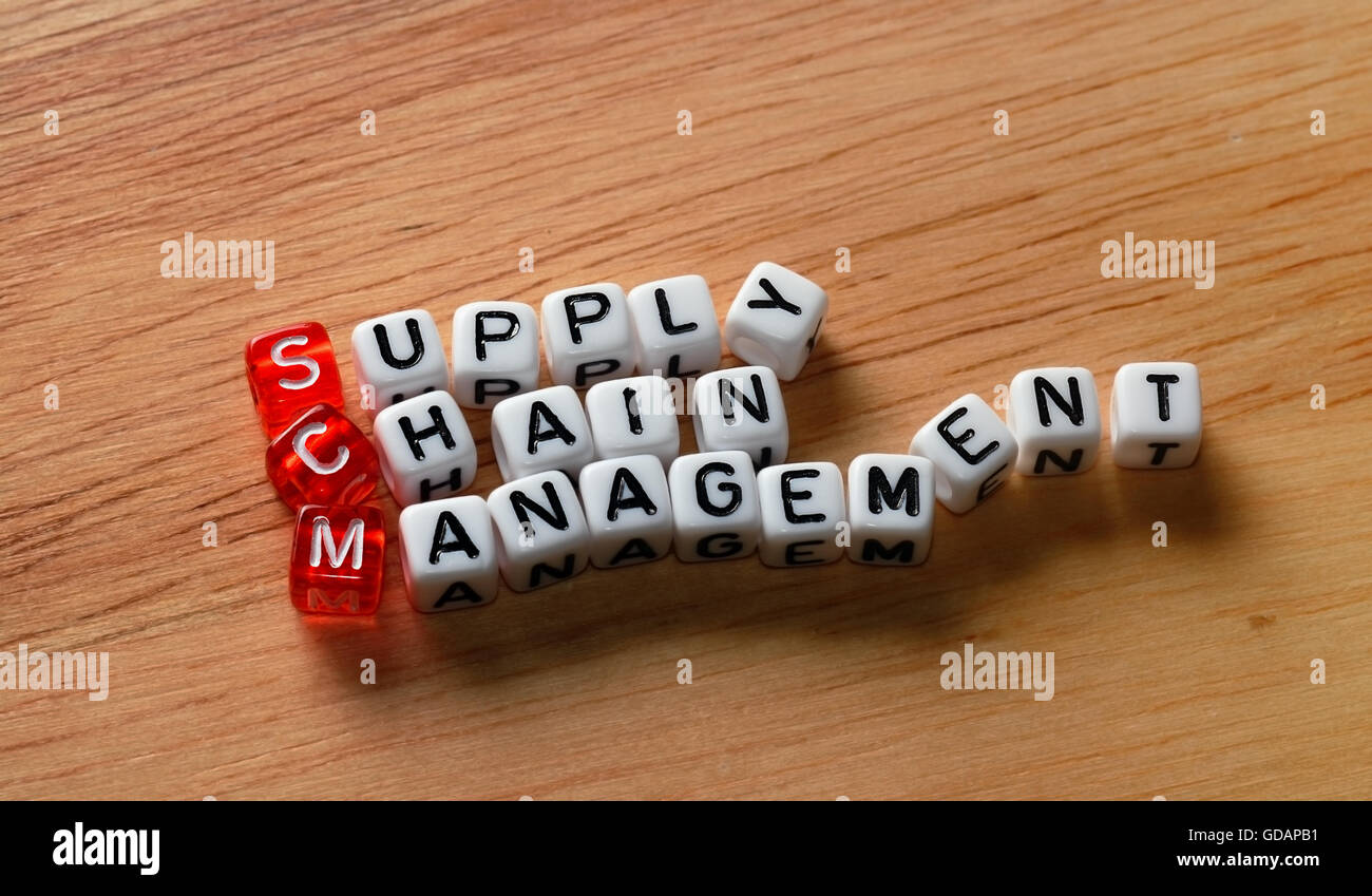 SCM Supply Chain Management written on dices on wooden background Stock ...