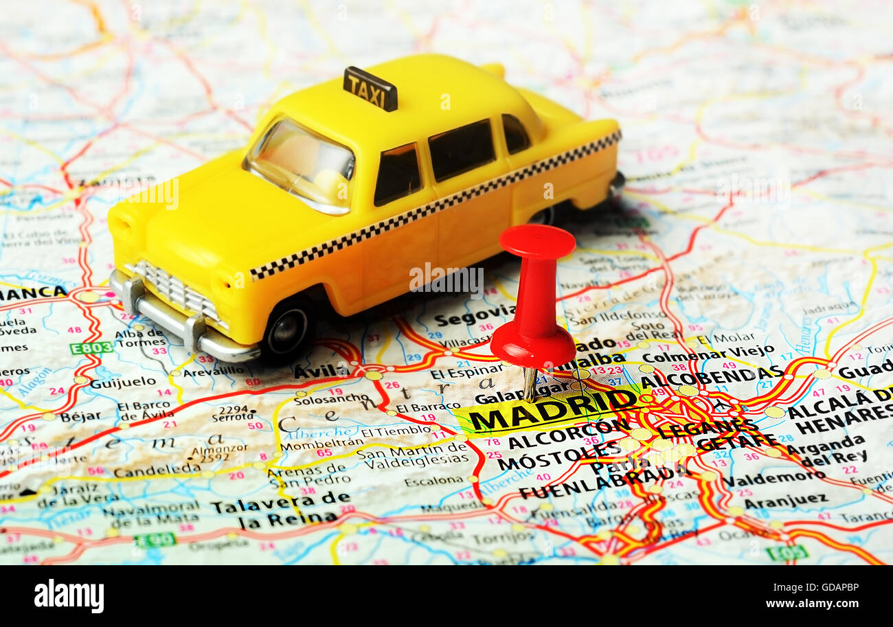 Close up of Madrid ,Spain map , red pin and taxi toy - Travel concept ...