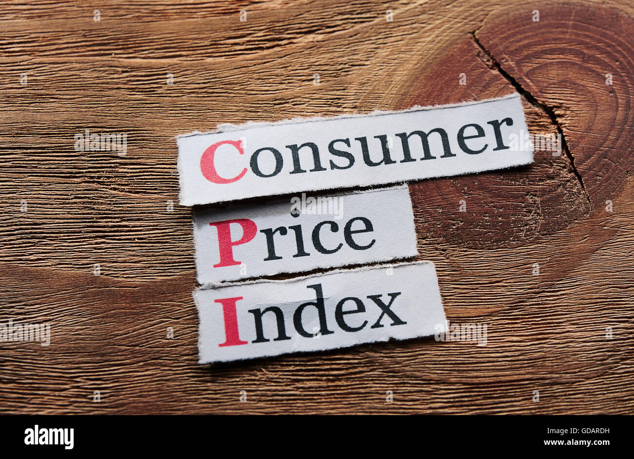 CPI - Consumer Price Index on paper on wooden background Stock Photo ...