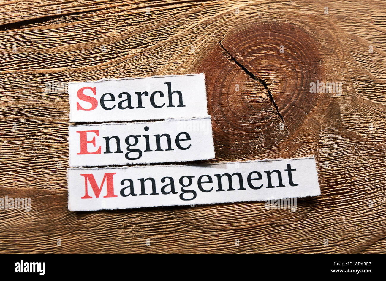 acronym SEM - Search Engine Management on paper on wood Stock Photo - Alamy