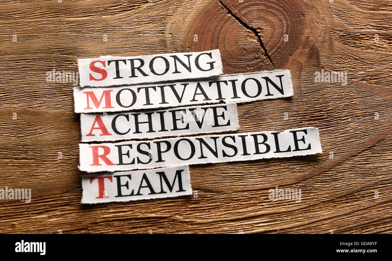 Smart acronym in business concept, words on cut paper on wood Stock ...