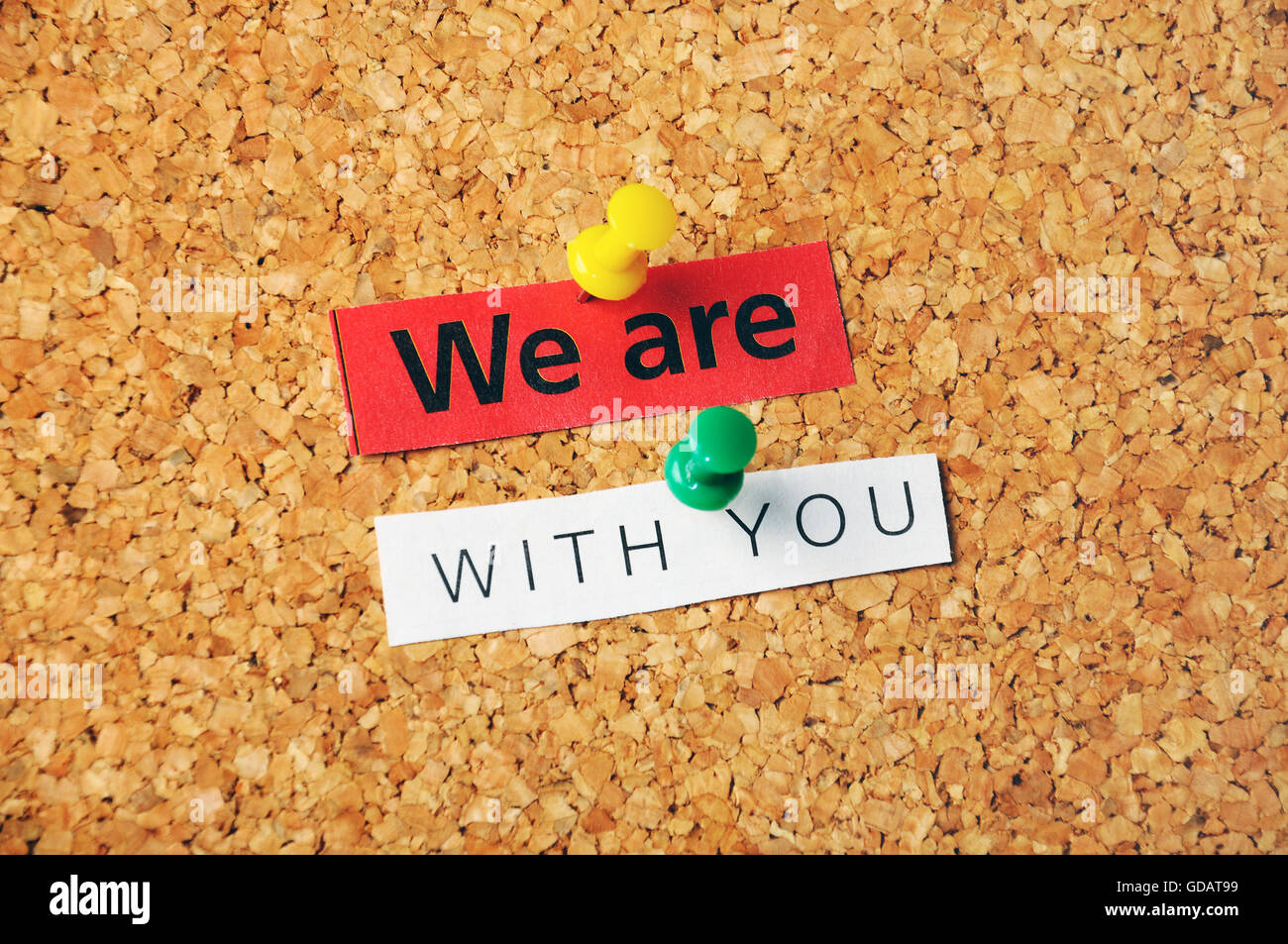 we are with you pinned on corkboard Stock Photo - Alamy