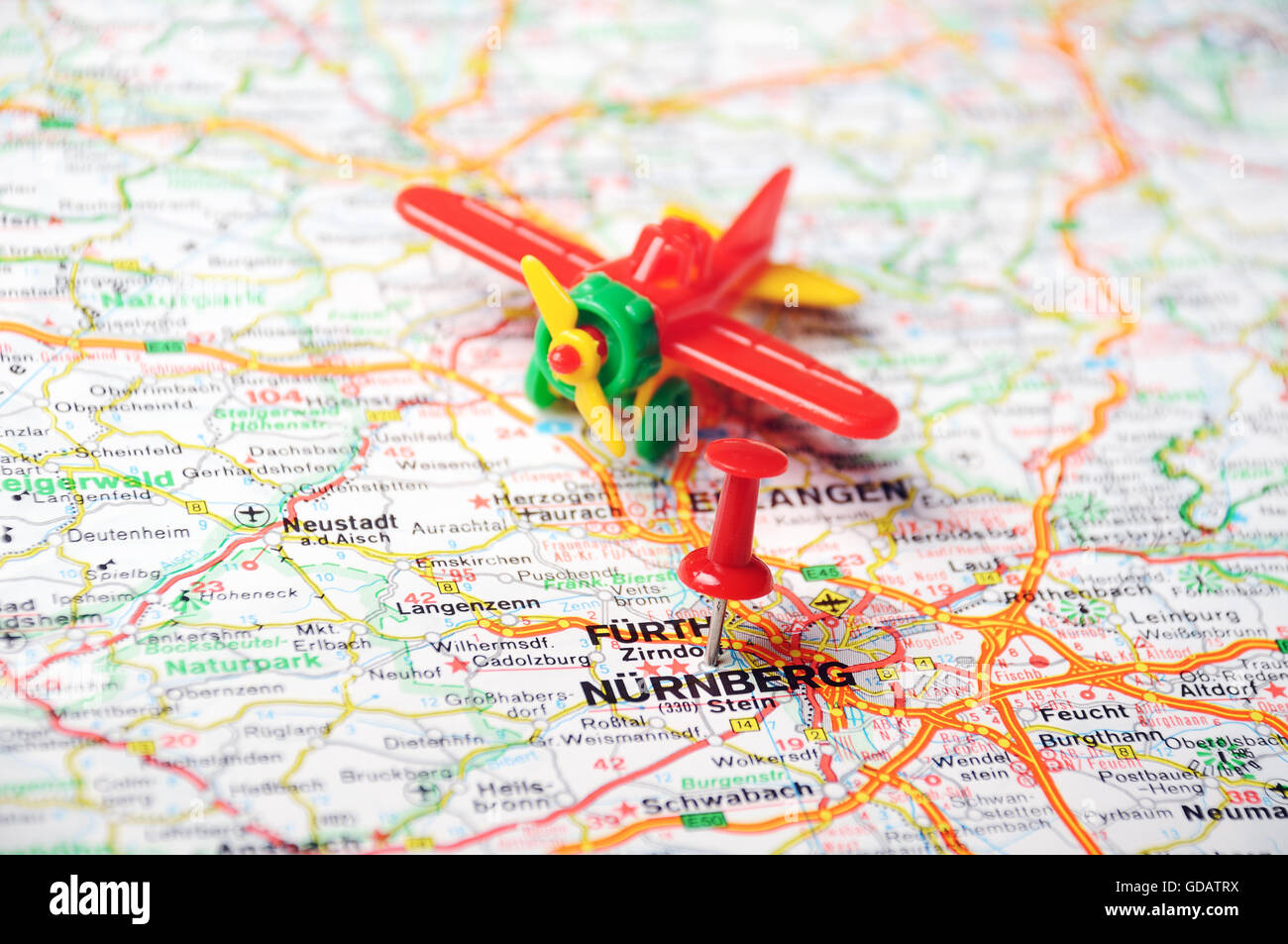 Close up of Nurnberg map with red pin and airplane - Travel concept ...