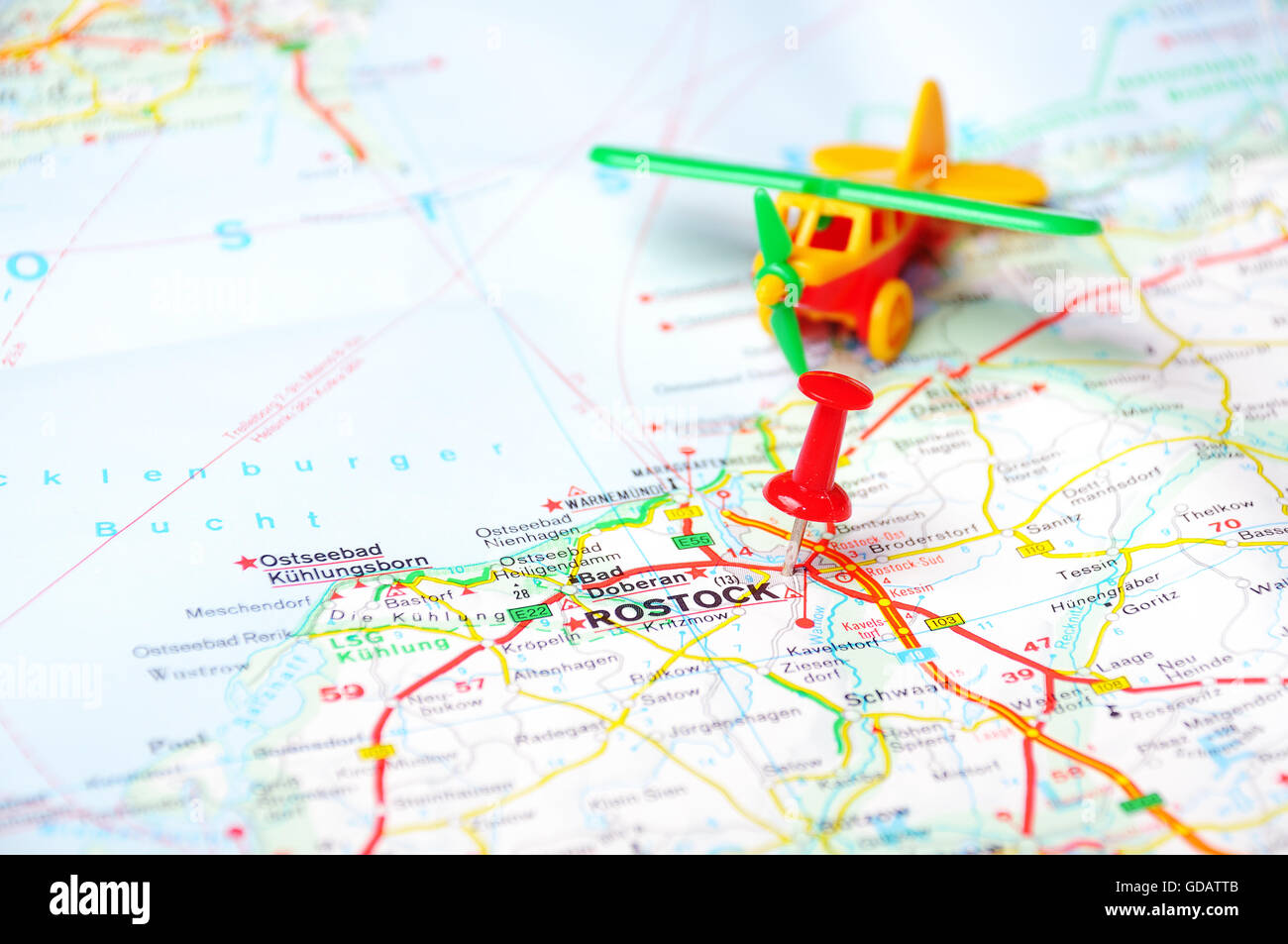 Close up of Rostock map with red pin and airplan - Travel concept Stock ...