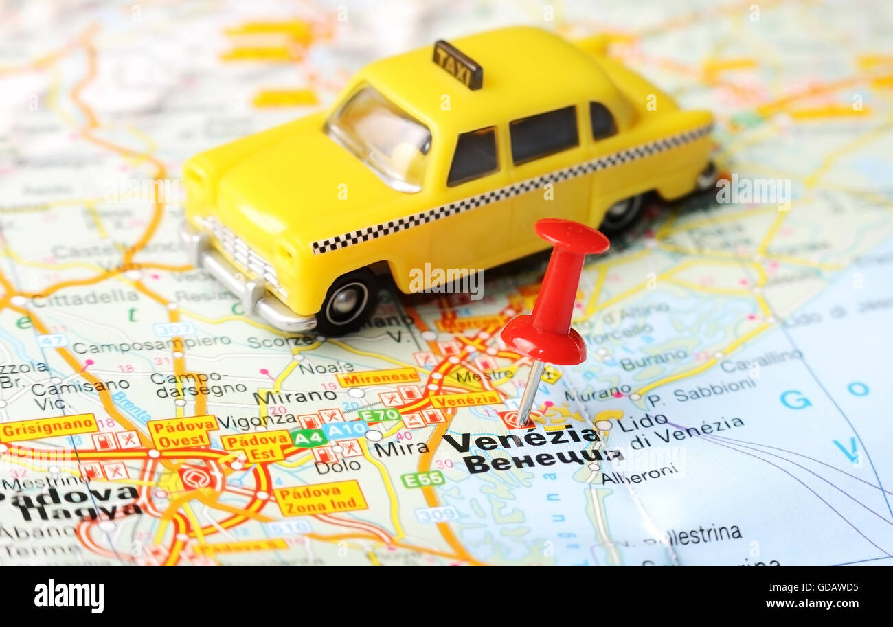 Close up of Venice , Italy map with red pin and a taxi - Travel concept ...