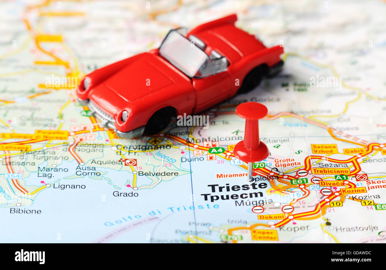 Close up of Trieste , Italy map with red pin and a car - Travel concept ...