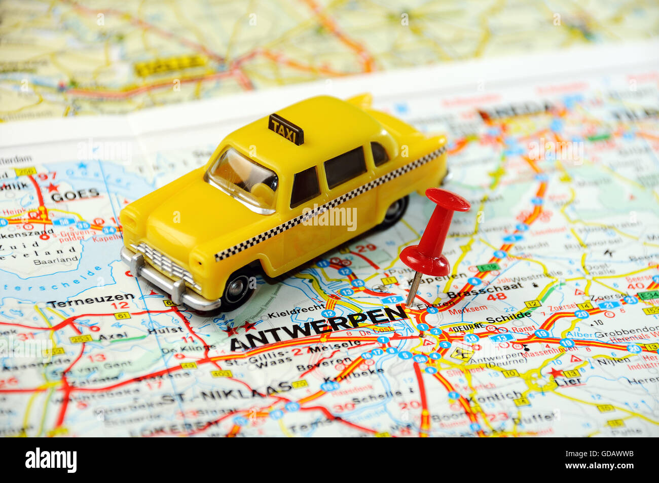 Red push pin pointing at Antverp , Belgium map and a taxi Stock Photo ...