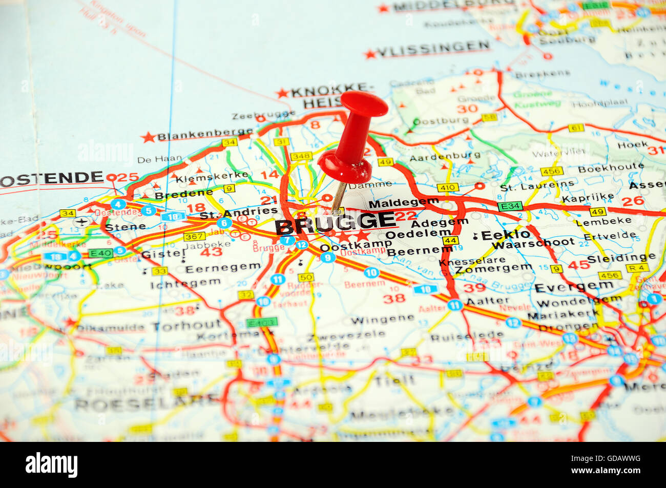 Red push pin pointing at Brugge , Belgium map and a airplane Stock ...