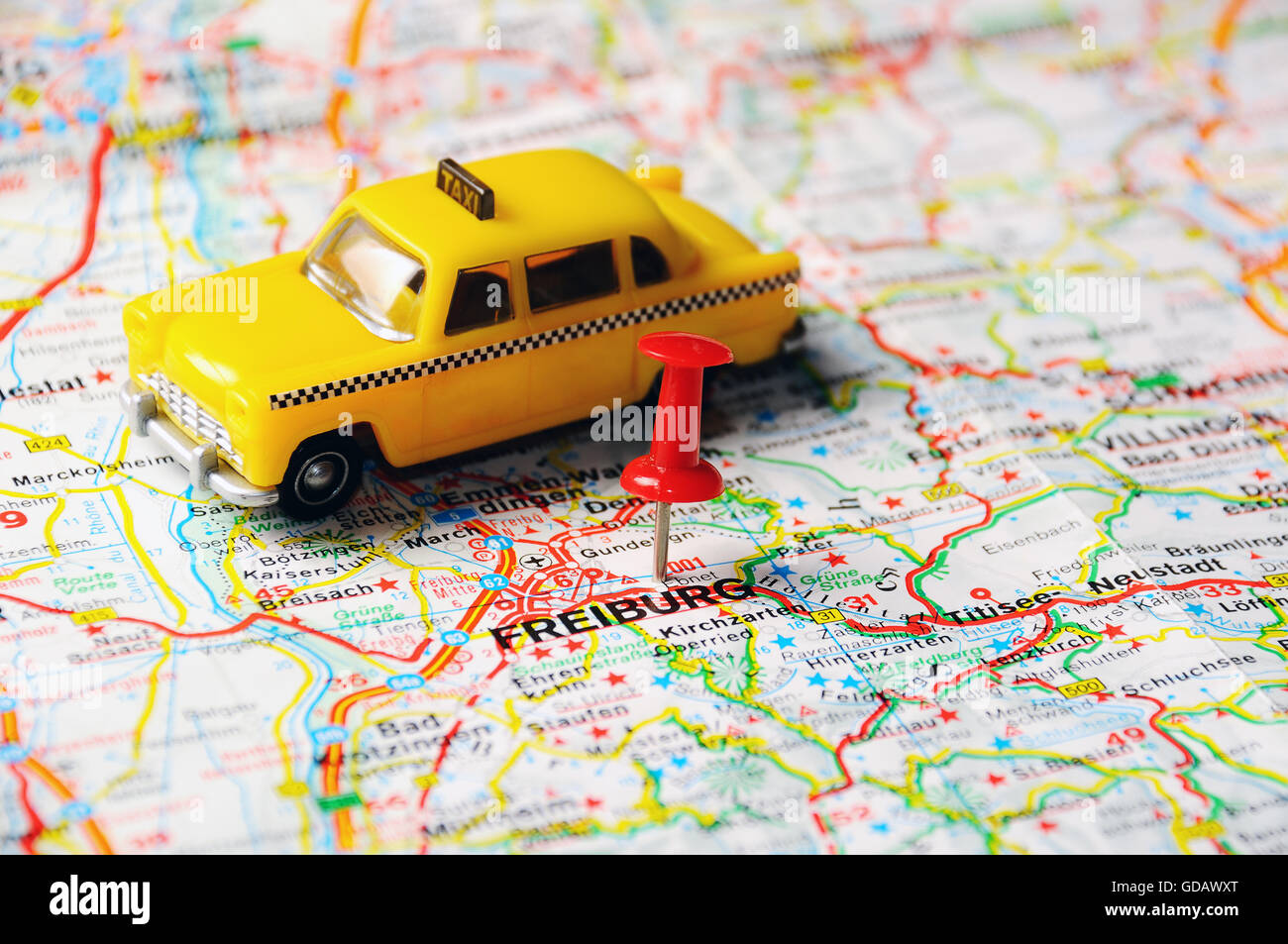 Red push pin pointing at Freiburg,Germany map and a taxi Stock Photo ...