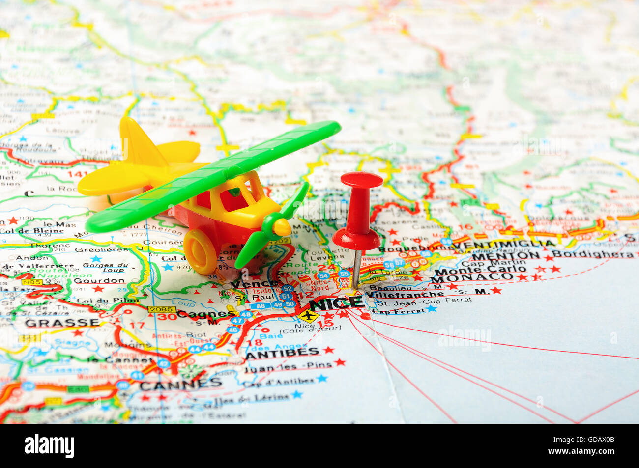 Red push pin pointing at Nice , France map and airplan Stock Photo - Alamy