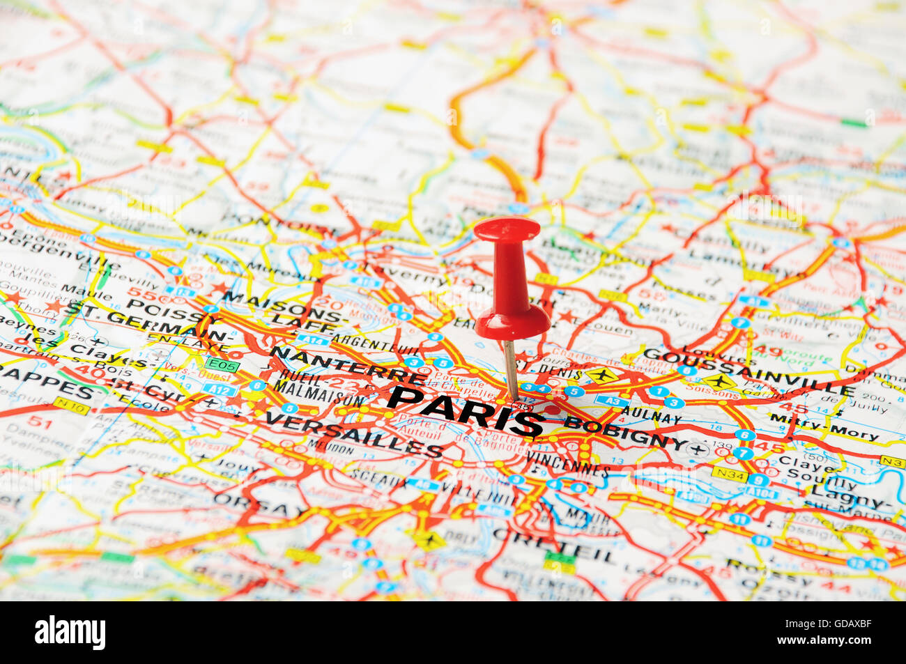 Red push pin pointing at Paris , France Stock Photo - Alamy