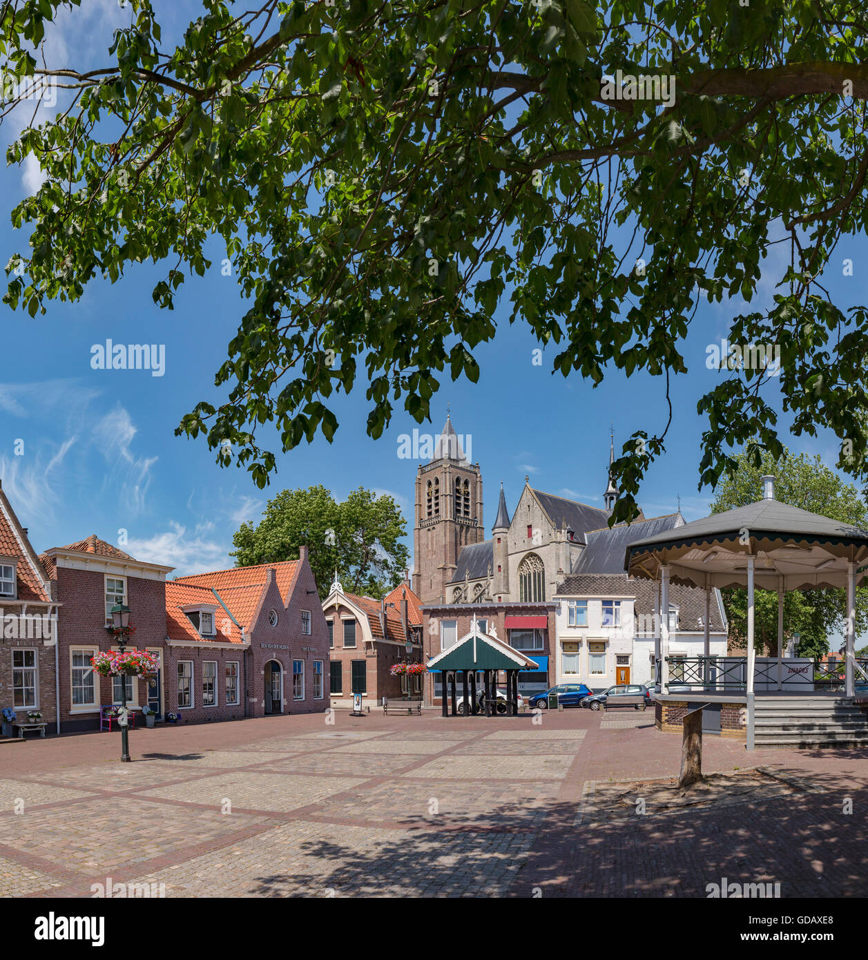 Tholen,Zeeland,Market square with a stocks,music gazebo and the Big ...