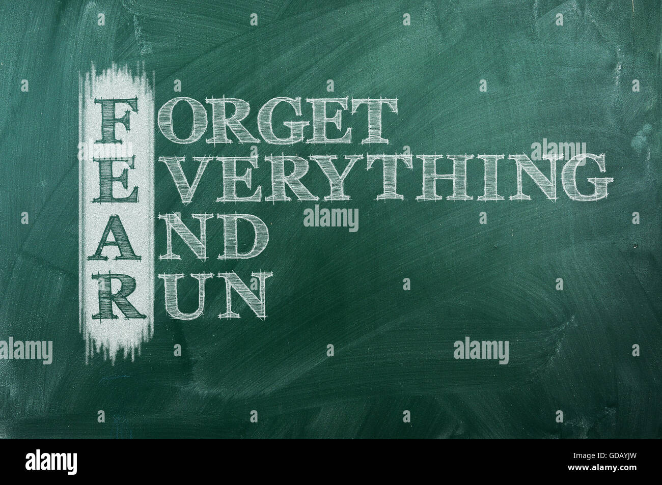 forget everything and run - FEAR acronym on green chalkboard Stock ...