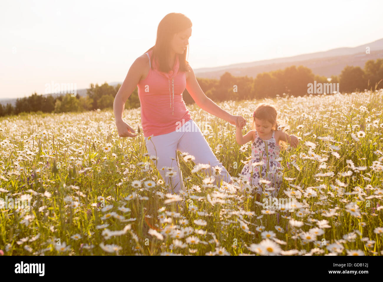 Happy joyful mother daughter daisy hi-res stock photography and images ...