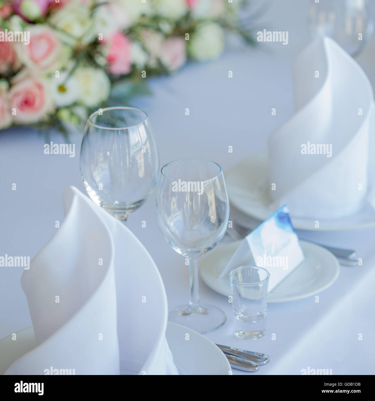 Glasses on restaurant. table appointments. wedding, floral decor Stock ...