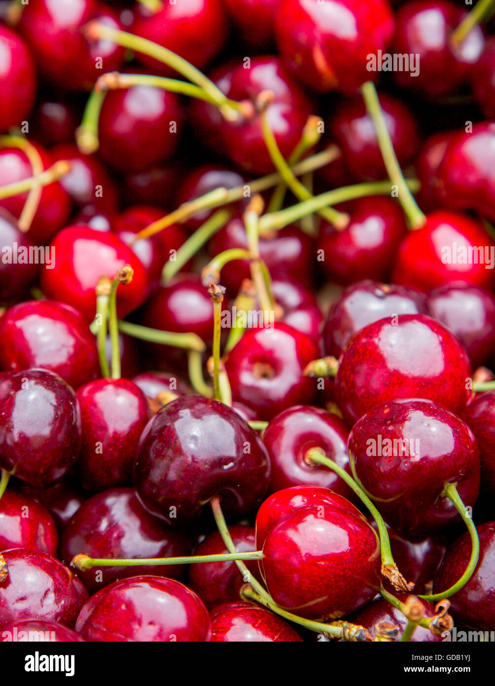 Close up of sweet red Cherry background Stock Photo - Alamy