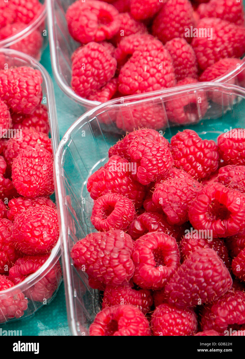 Ripe juicy raspberry in boxes hi-res stock photography and images - Alamy