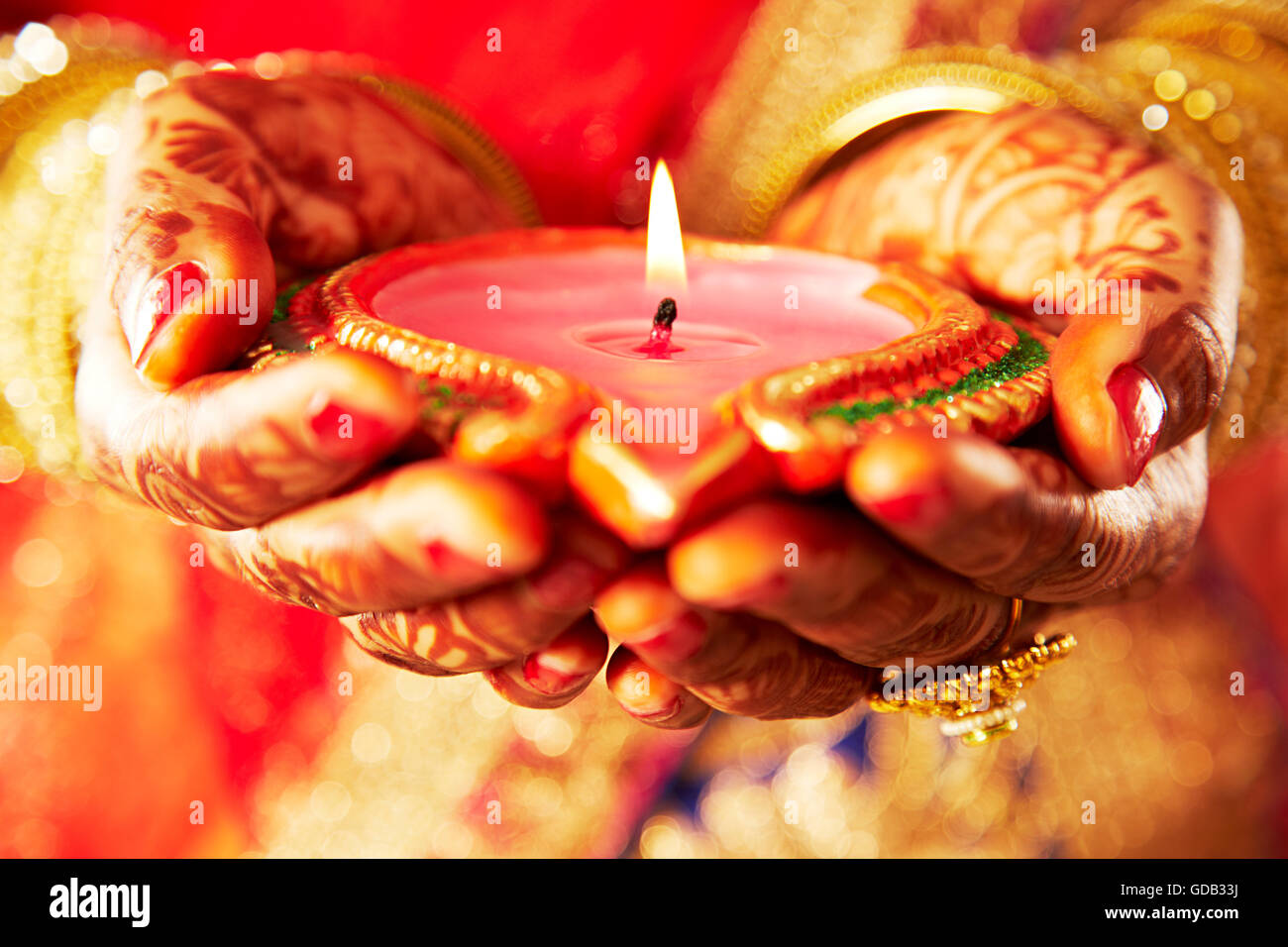 1 indian Adult Woman Bride Diwali Festival Hands-cupped Diya Showing ...