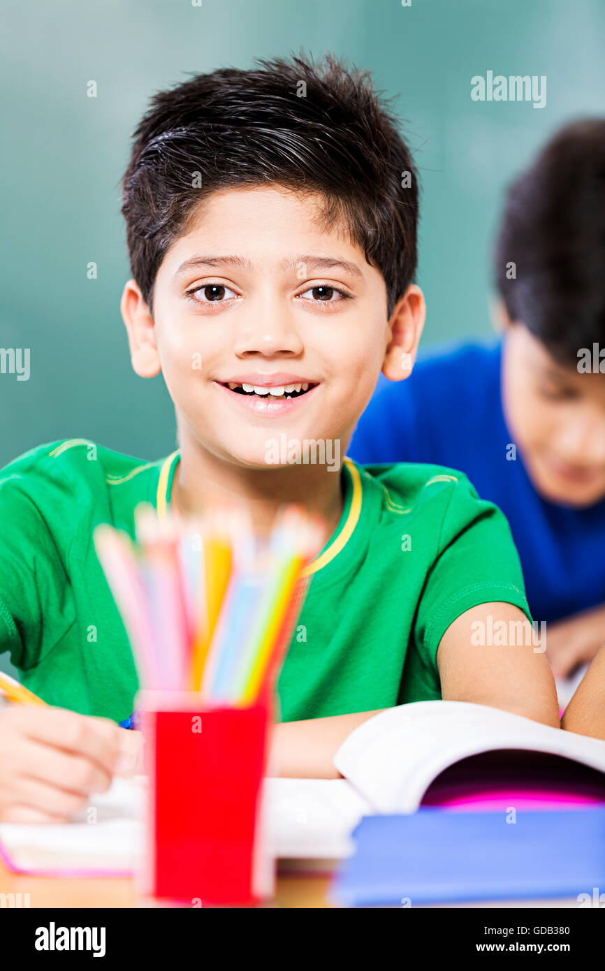 1 child boy School Student Studying in a Classroom Stock Photo - Alamy