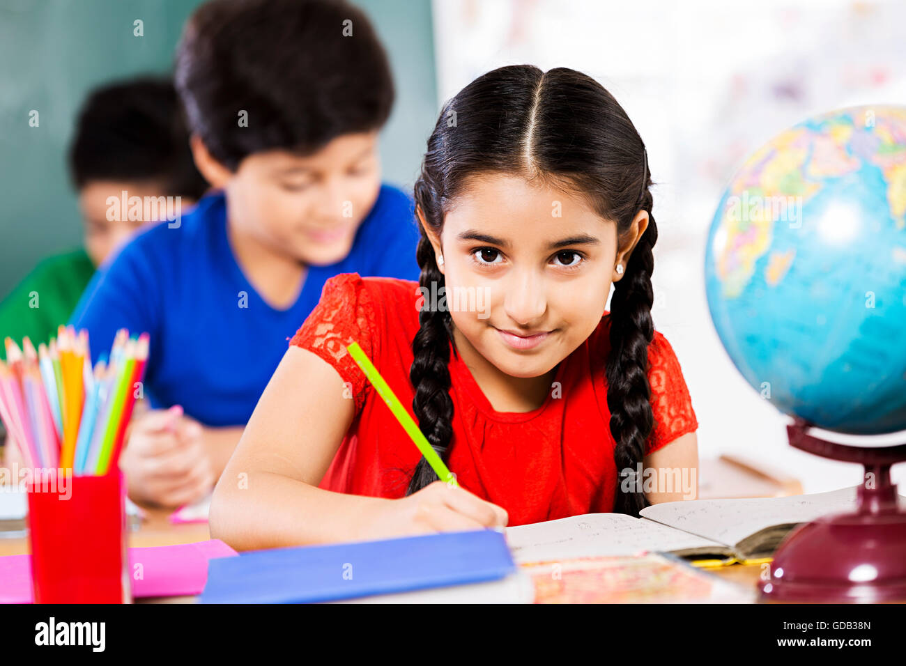 1 child Girl School Student Studying in a Classroom Stock Photo - Alamy