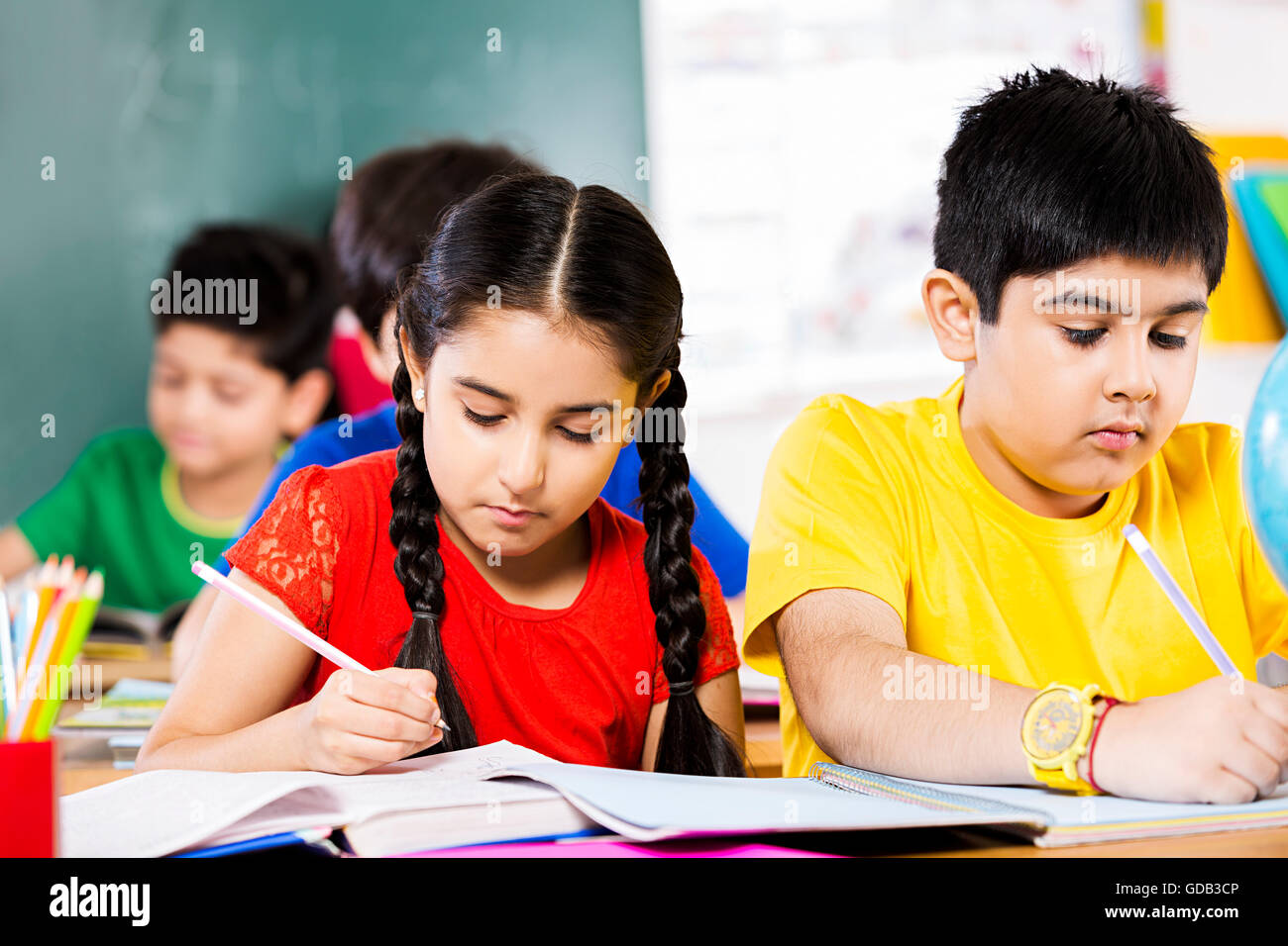 2 kids Girl and Boy Friends School Student Studying in a Classroom ...