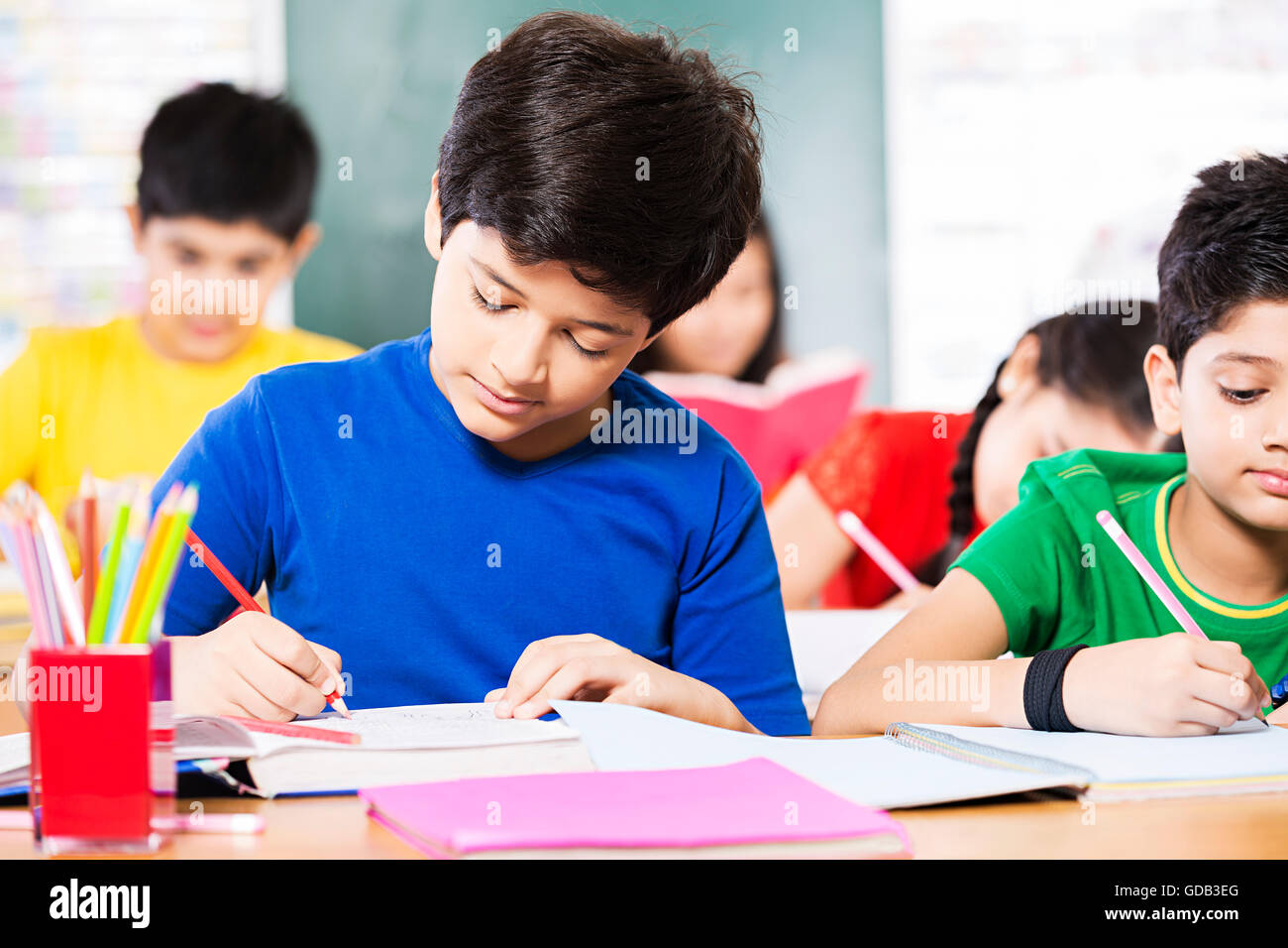 Asian boys on table hi-res stock photography and images - Alamy