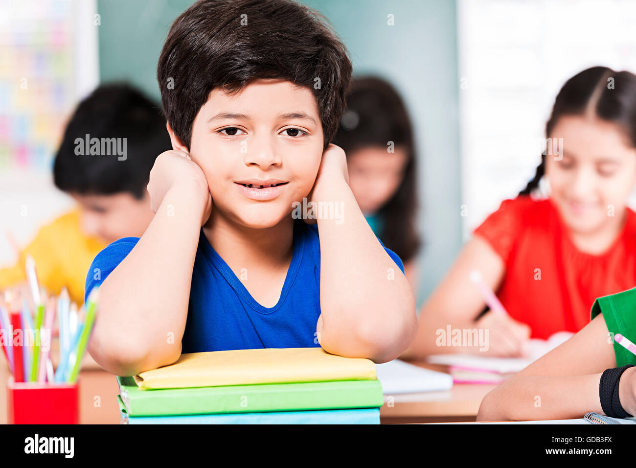 1 Boy School Student Studying in a Classroom Stock Photo - Alamy