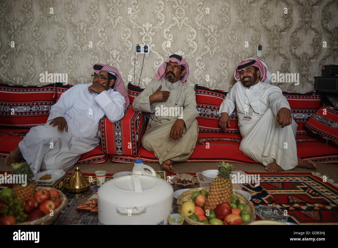 Officials of the Al Galayel Hunting Festival in Qatar relax in their ...