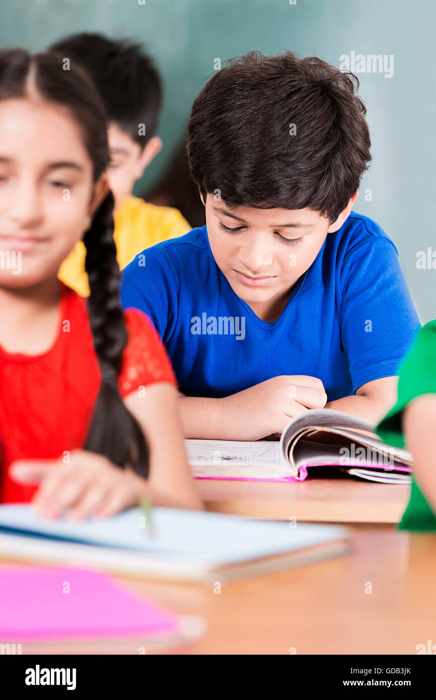 2 kids boy and Girl School Student Studying in a Classroom Stock Photo ...