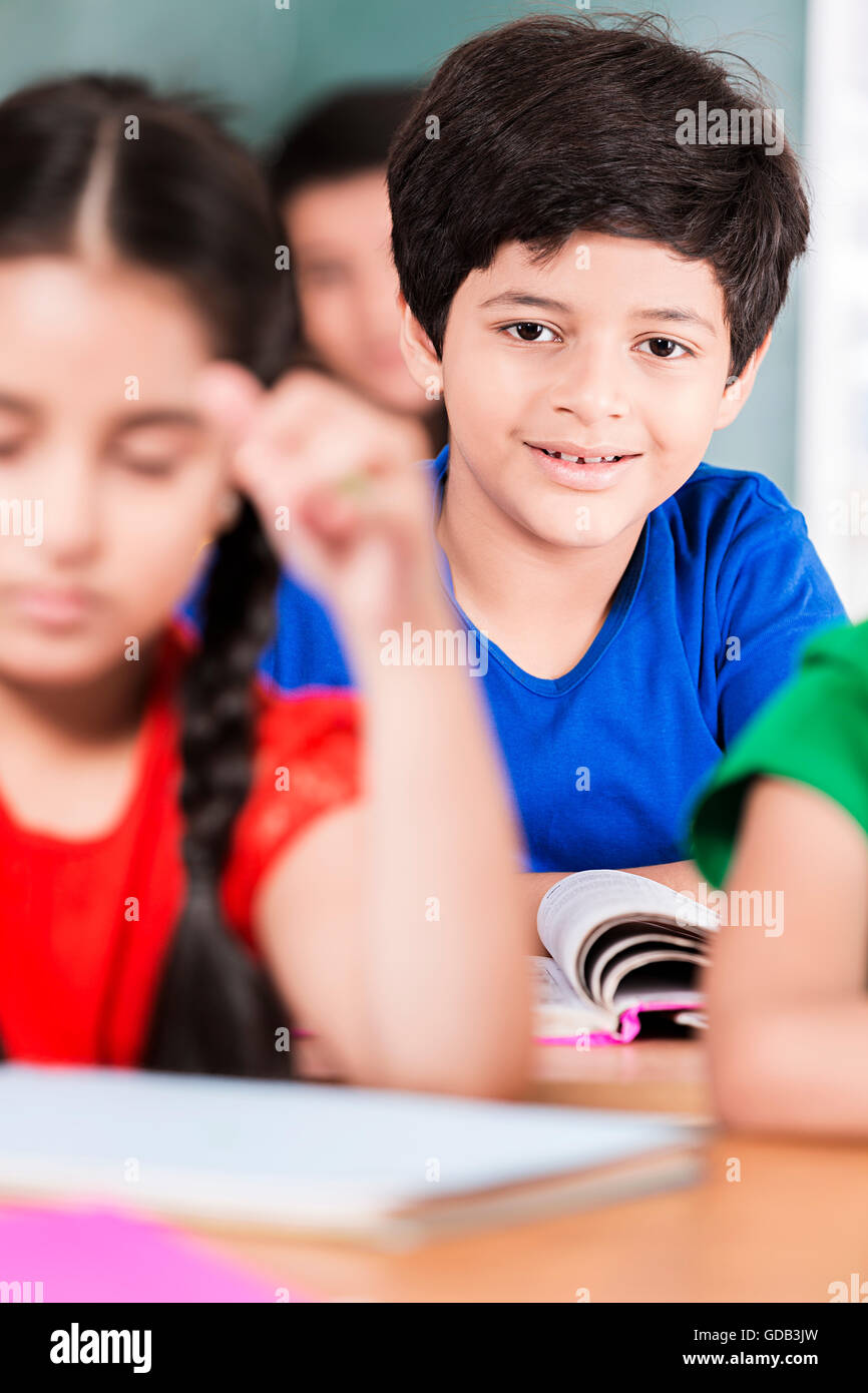 2 kids boy and Girl School Student Studying in a Classroom Stock Photo ...