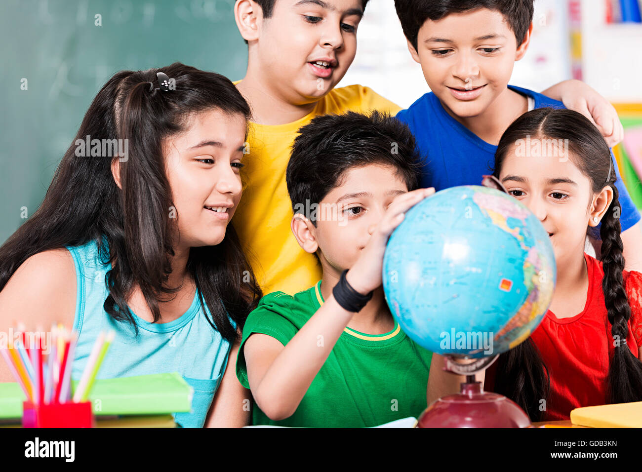 5 kids Girls and Boys friends School Student sitting Classroom ...