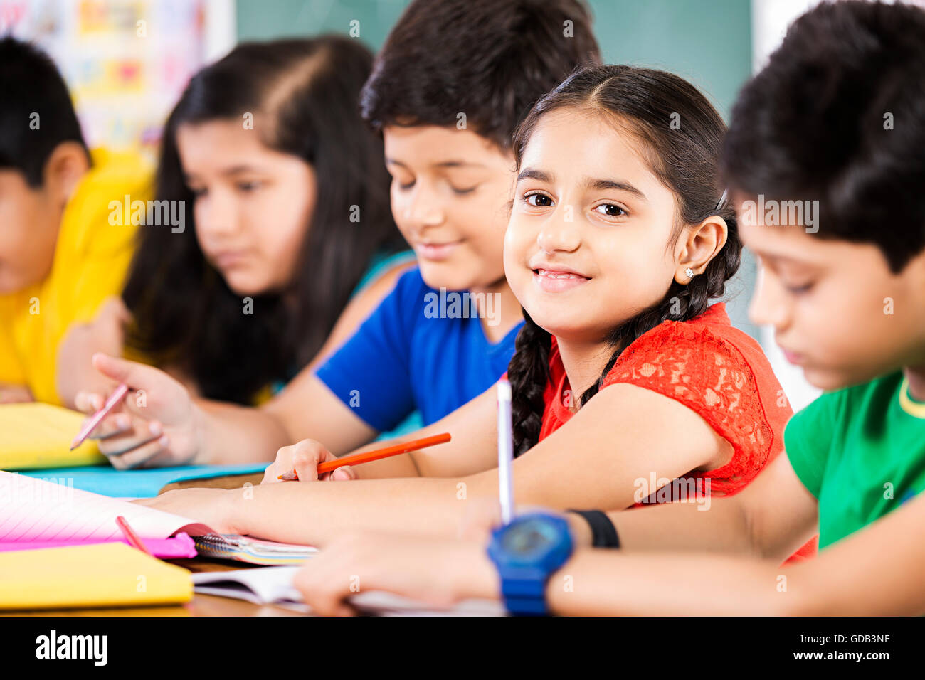 5 kids Girls and Boys School Student Studying in a Classroom Stock ...