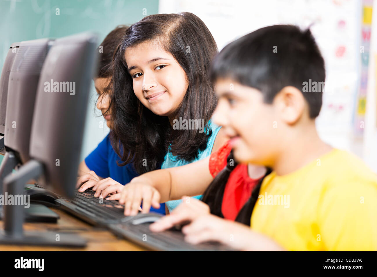 4 kids Boys and Girls School Student Sitting Classroom Computer ...