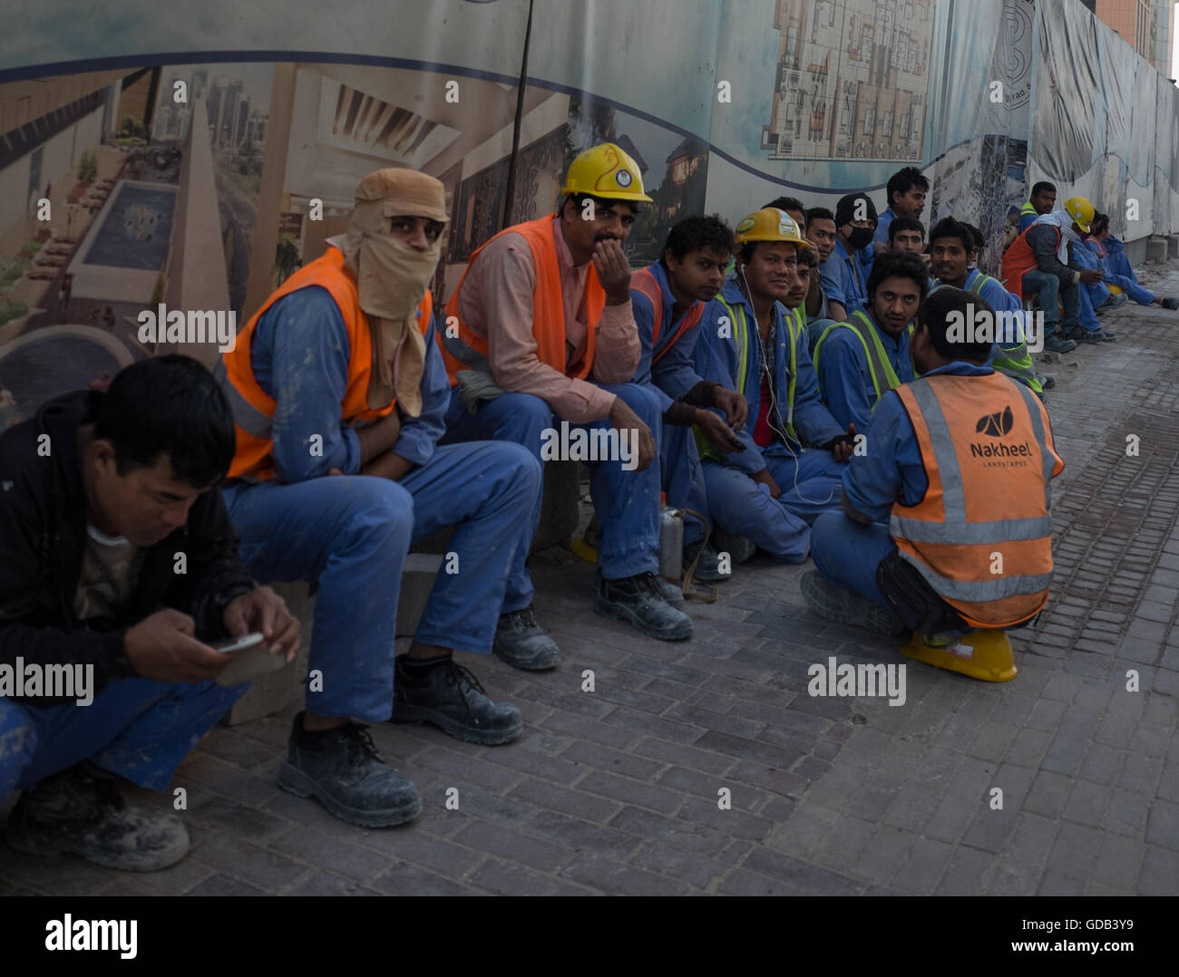Qatar workers resting hi-res stock photography and images - Alamy