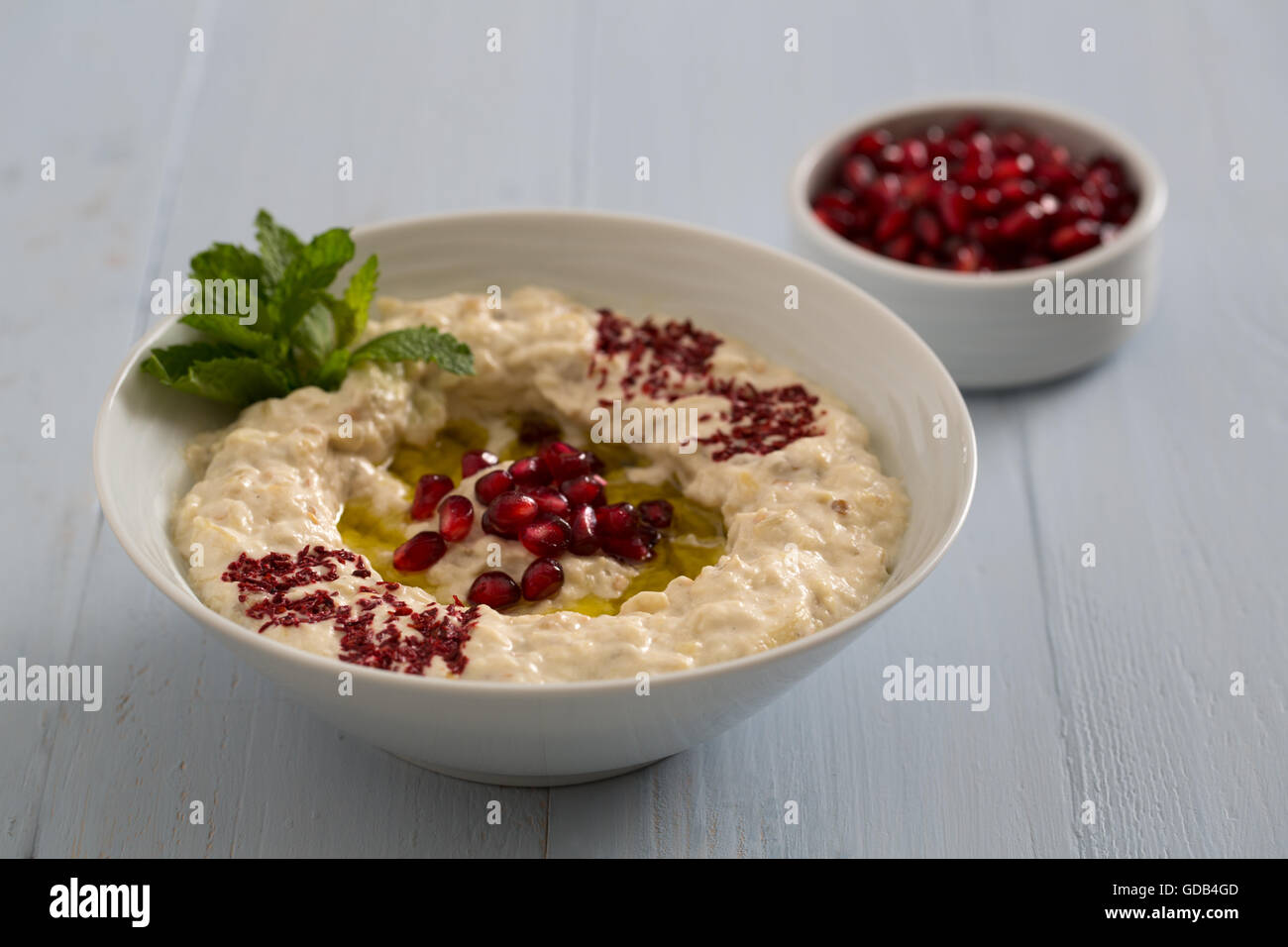 Moutabel with pomegranate seeds Stock Photo - Alamy