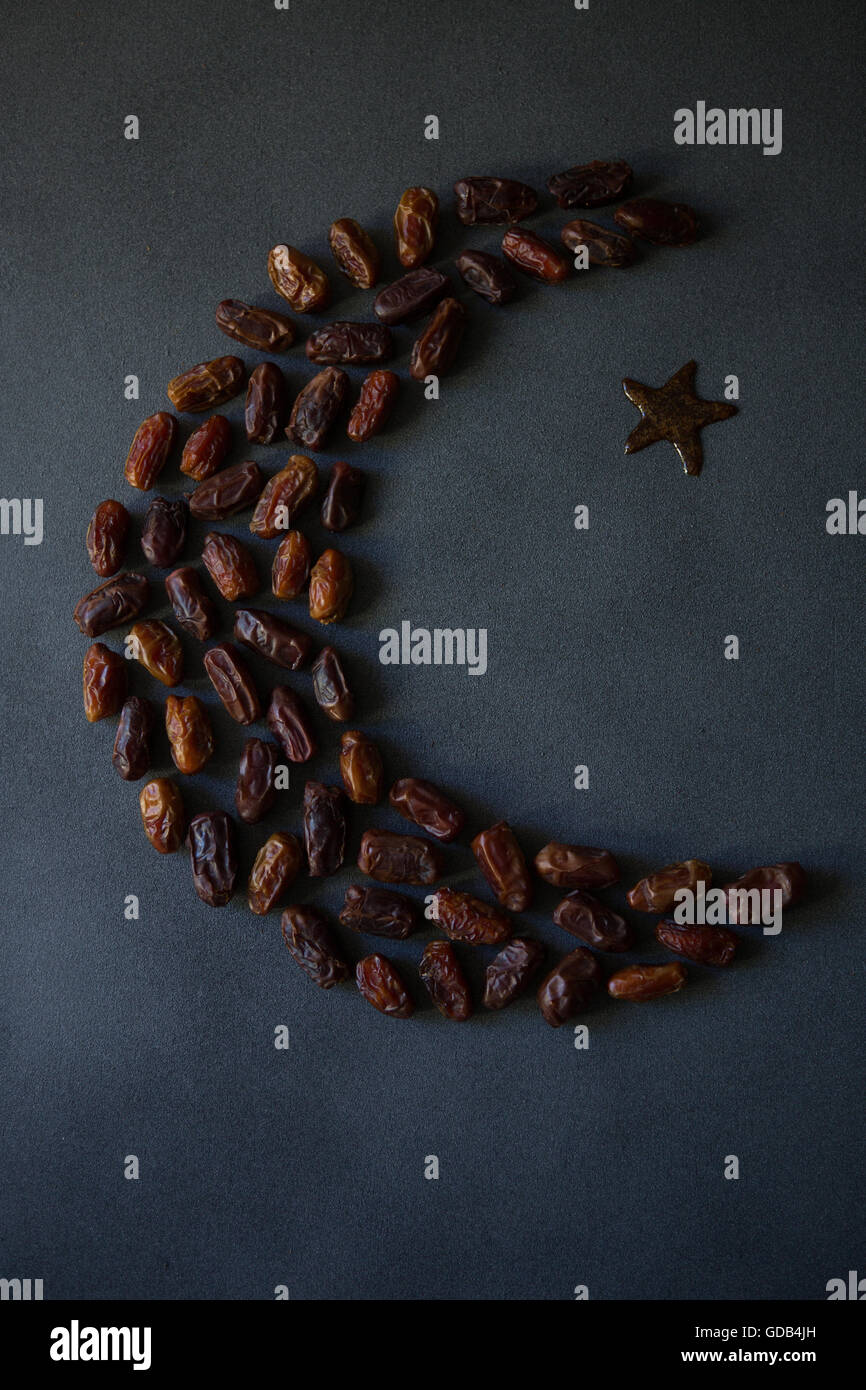 Dates in the shape of a crescent moon, with a star formed from date ...