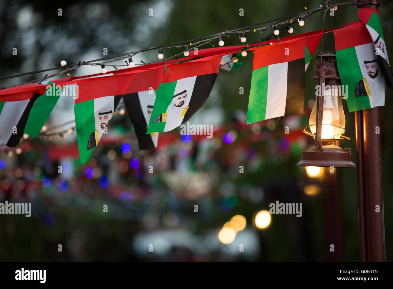 Emirati National Day flag bunting shows the UAE flag with a photograph ...