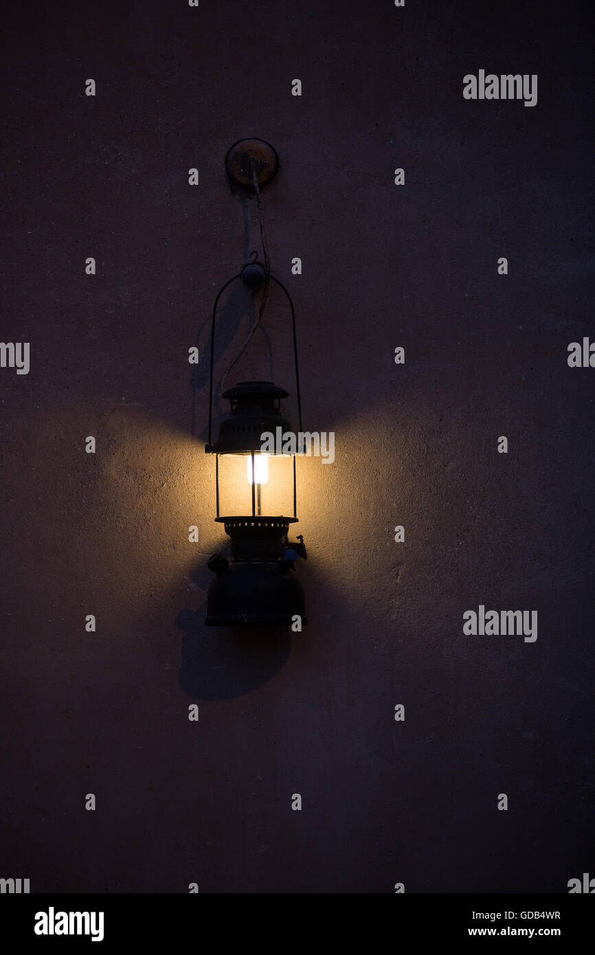A traditional Emirati lantern hanging on a wall at the Heritage Village ...