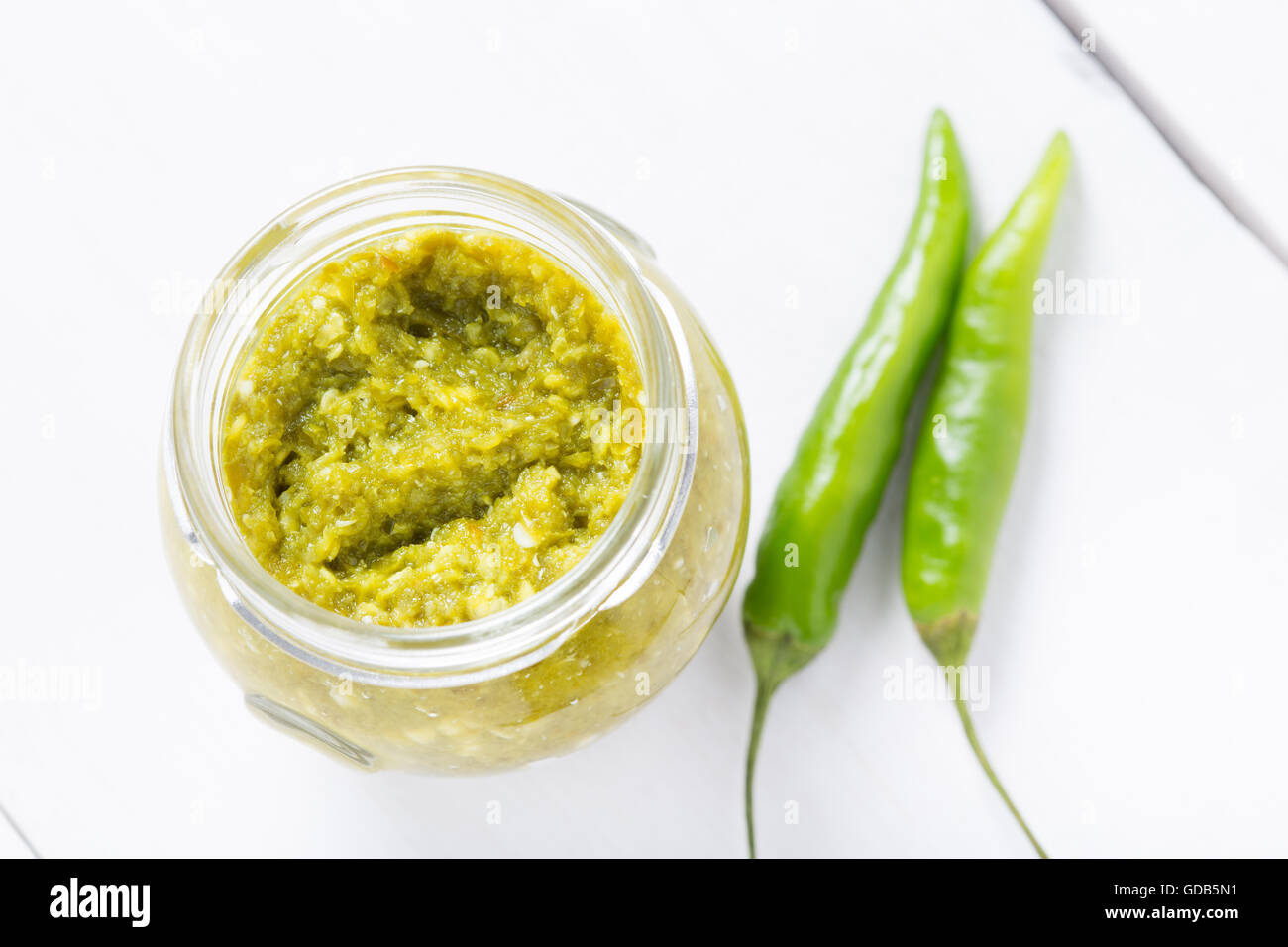 Natural hot green chilli sauce Stock Photo - Alamy