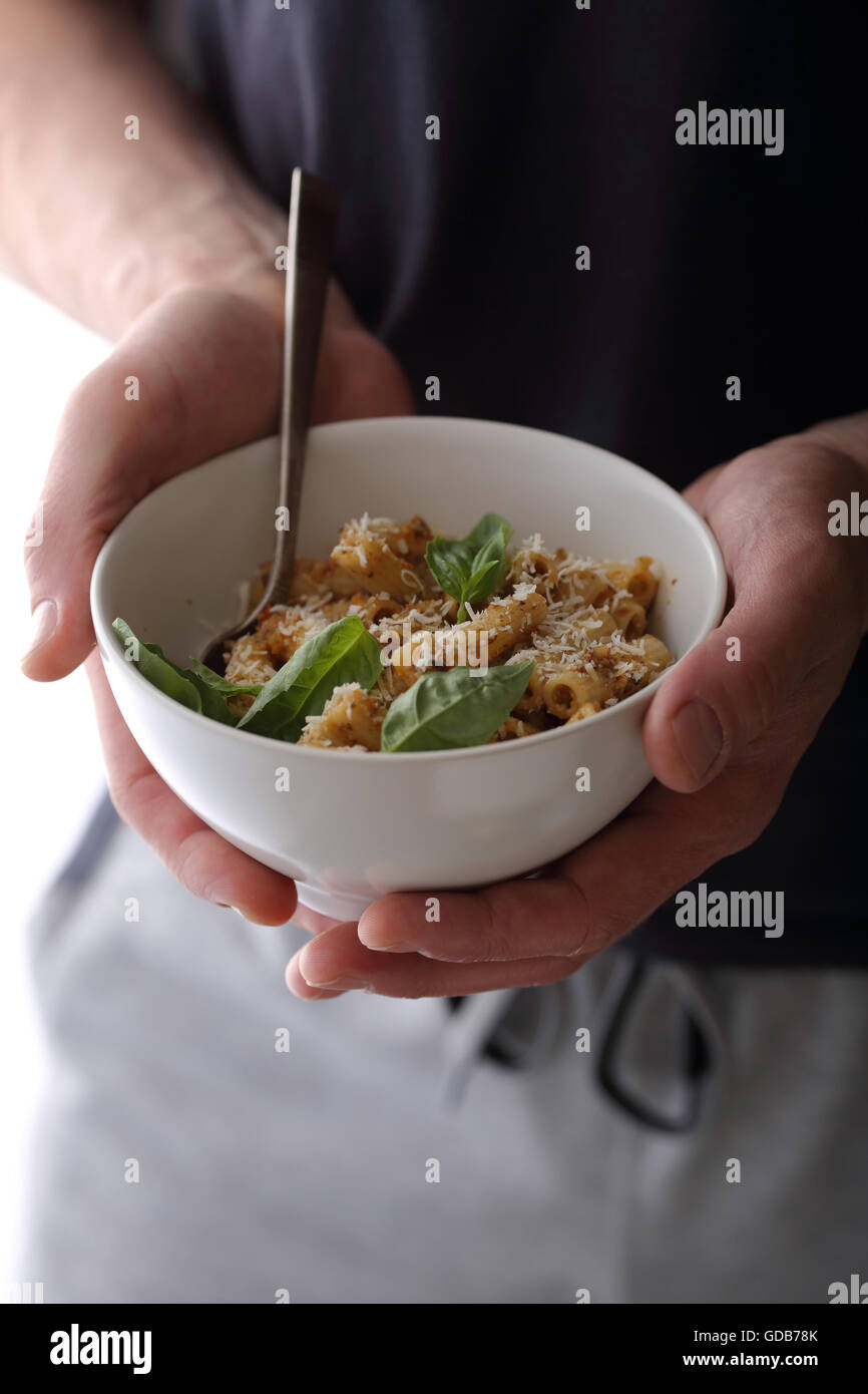 Hands holding bowl hi-res stock photography and images - Alamy