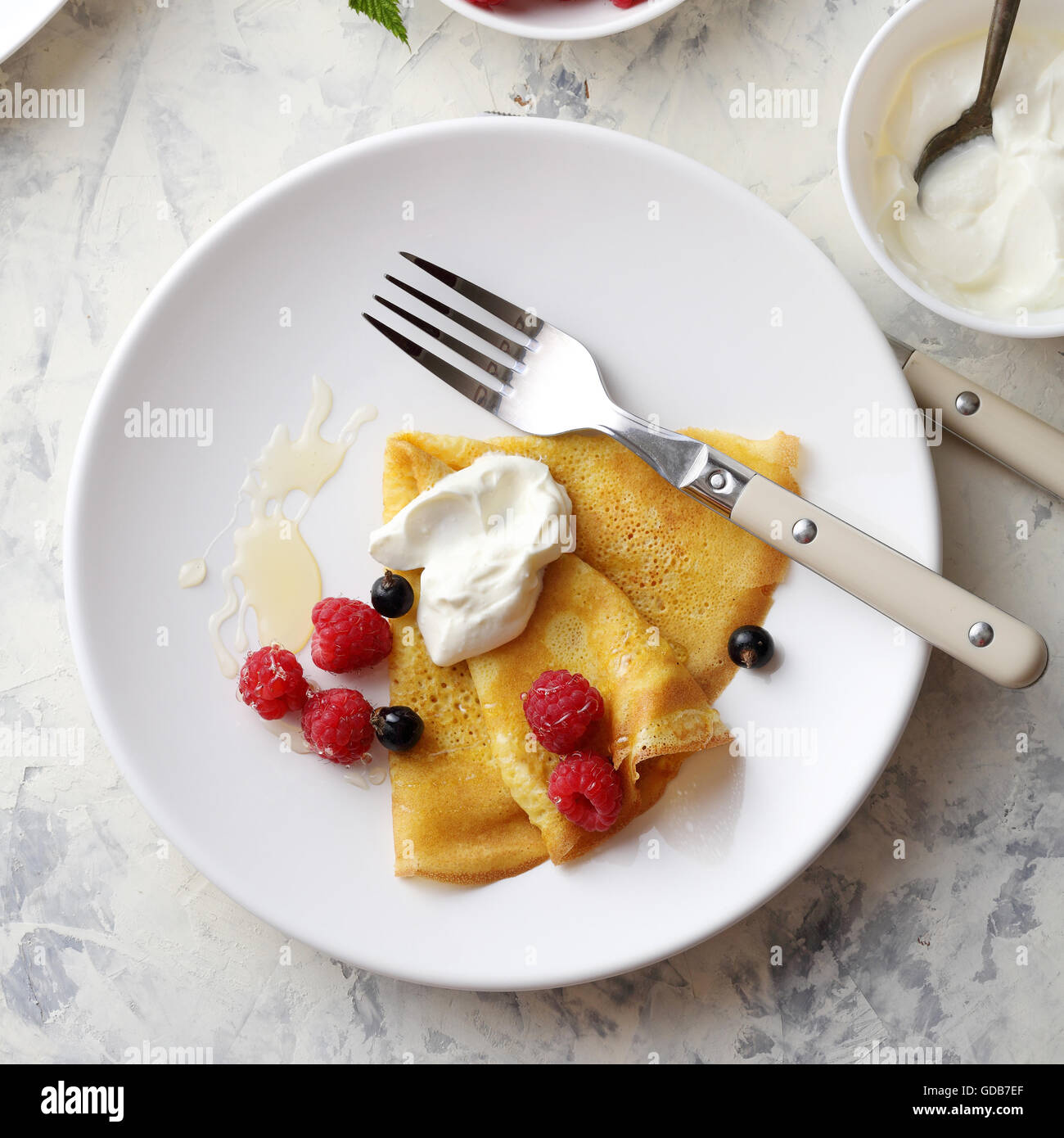 breakfast crepe with raspberry and cream, food top view Stock Photo - Alamy