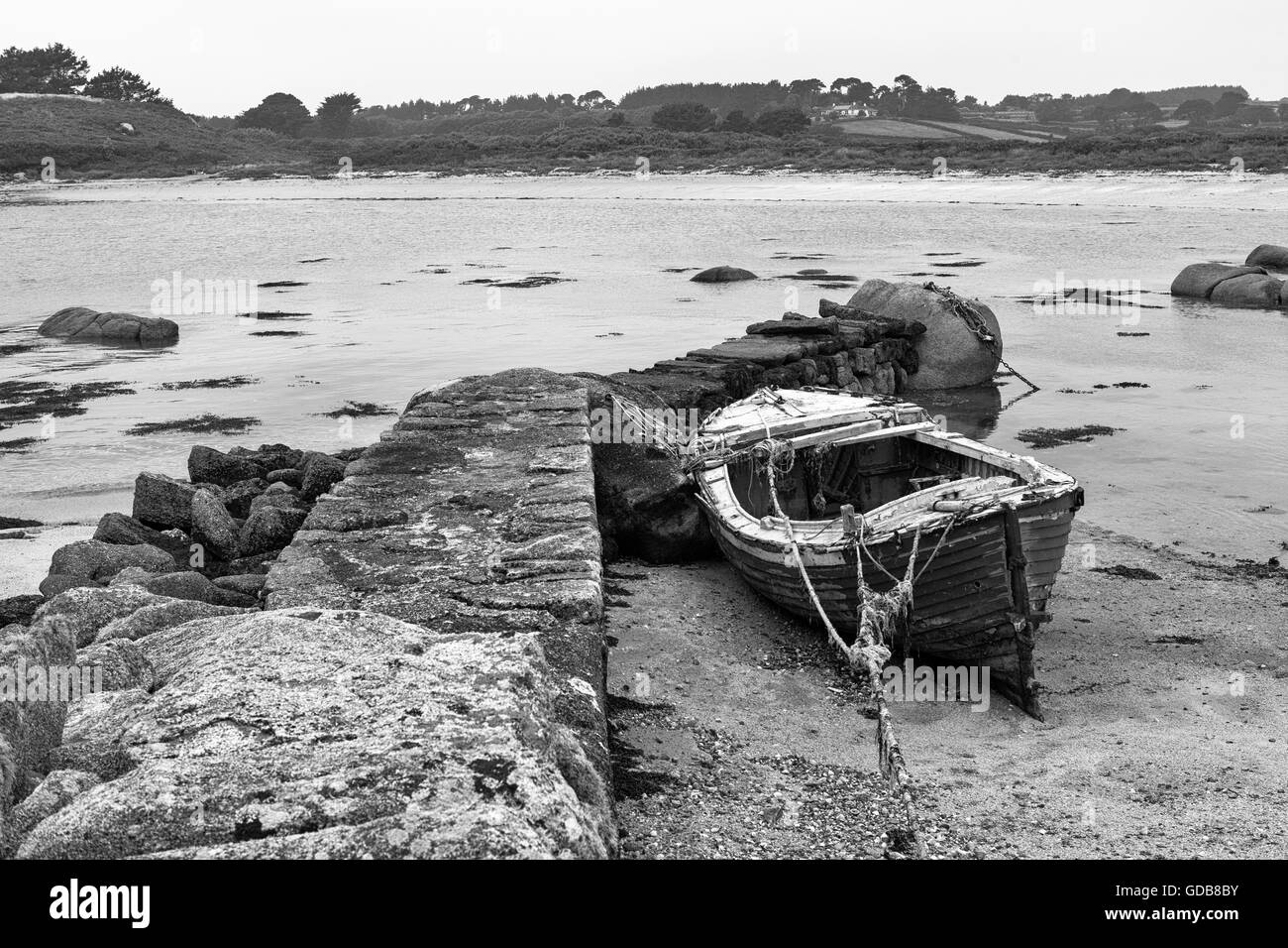 Abandoned boat by an old stone jetty, Porth Hellick, St. Mary's, Isle ...