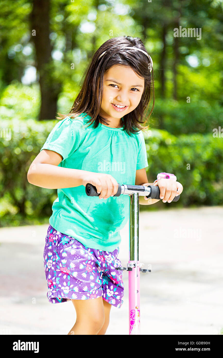Portrait smiling girl scooter hi-res stock photography and images - Alamy