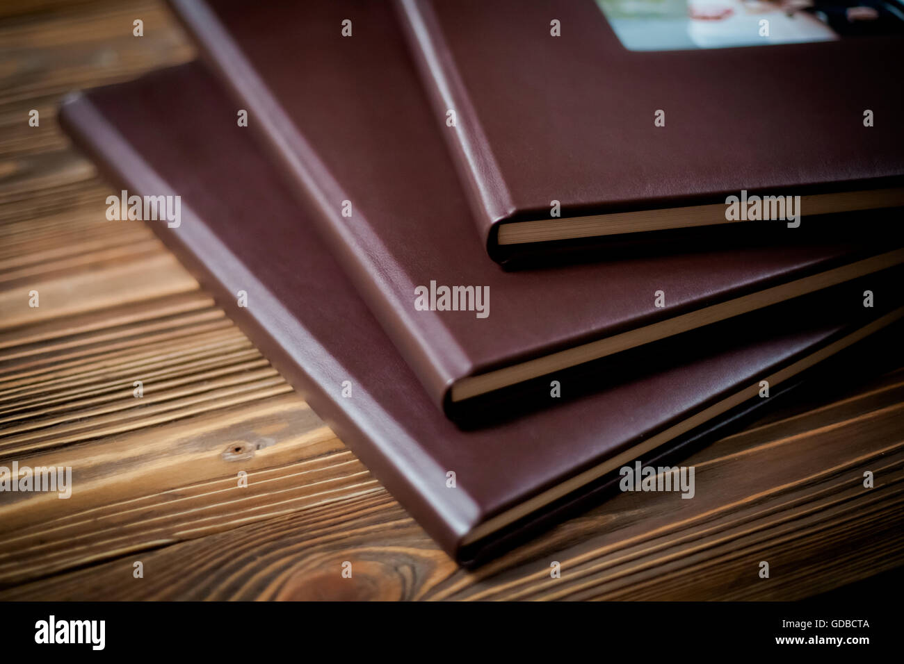 Opened book - photoalbum closeup Stock Photo - Alamy